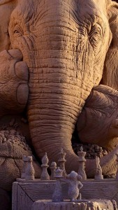 Impressive Sand Sculpture Of A Life-Size Elephant Playing Chess