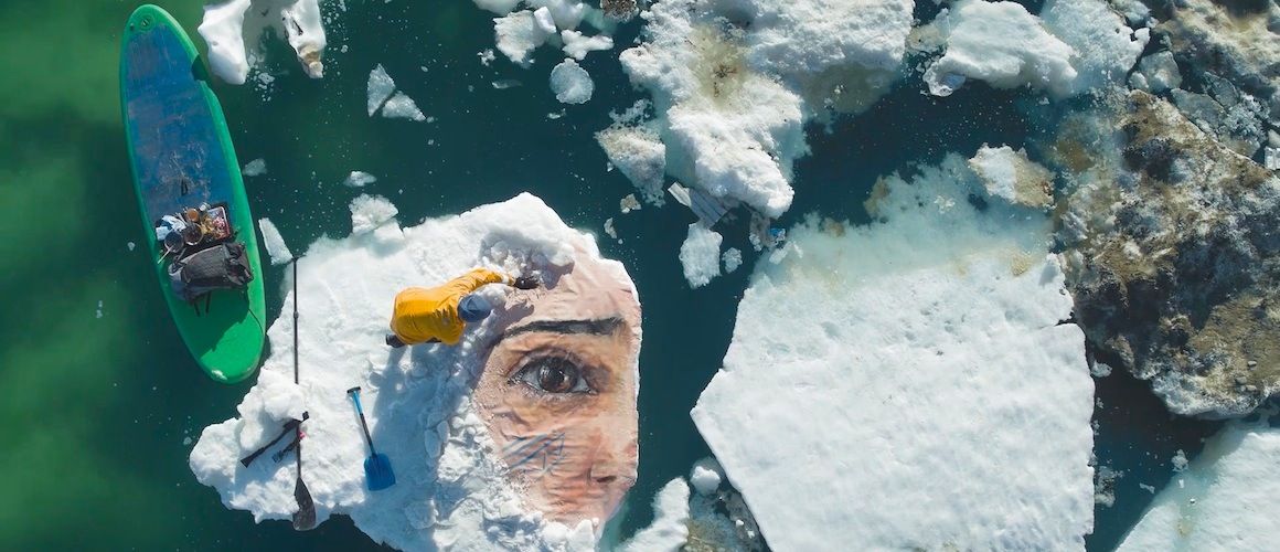 "What If You Fly" - Mural Created on Melting Ice by Artist Sean Yoro