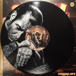 Portraits of Legendary Musicians Painted on Vinyl Records by Daniel Edlen